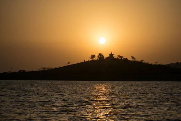 Sunset Over A Temple